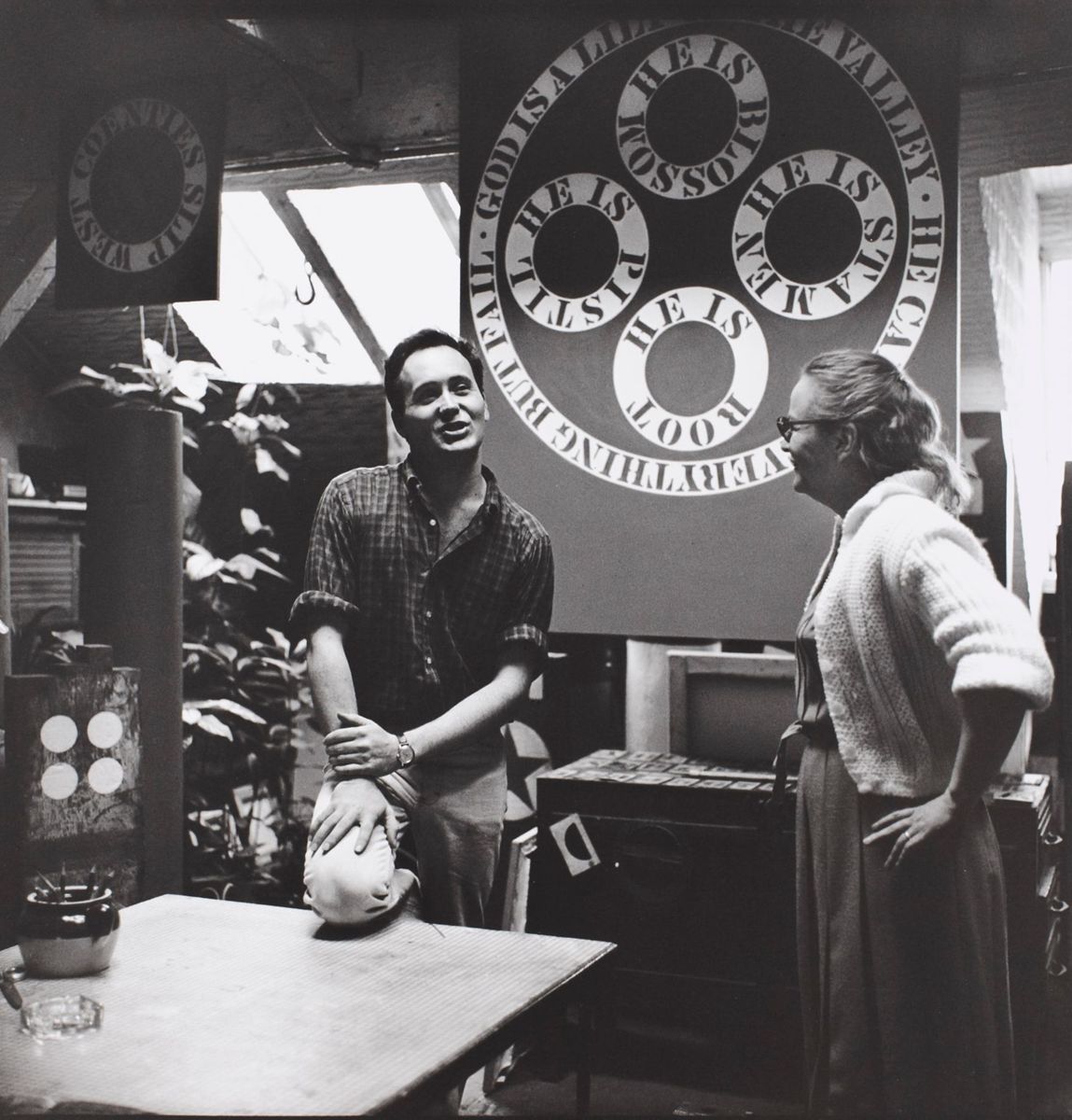 Robert Indiana and Eleanor Ward at Coenties Slip Studio, New York City