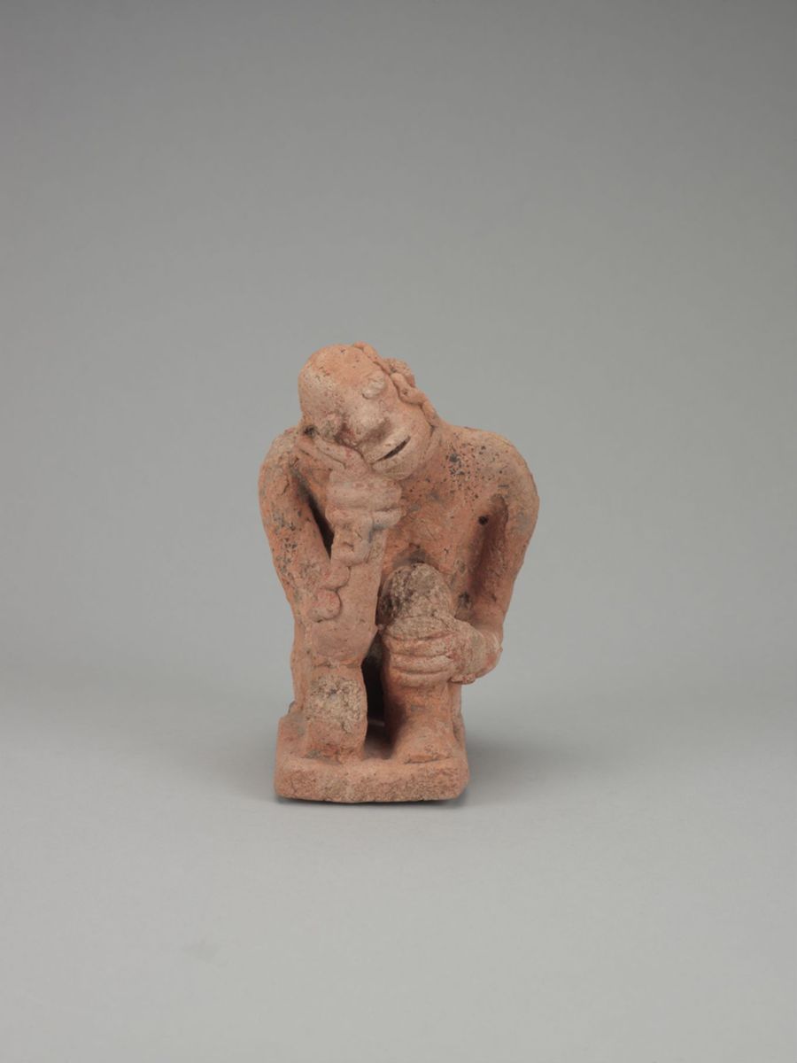hunched figure
